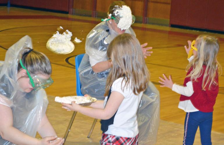 EXCEEDING THEIR GOAL HITTING THE BOOKS: Harrisville teachers accept ...