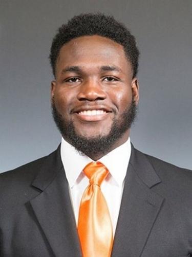 College football: Syracuse senior Jonathan looks out for more than just ...