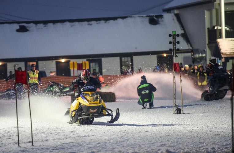Hundreds turn out for snowmobile drag racing event NO SNOW, NO PROBLEM ...