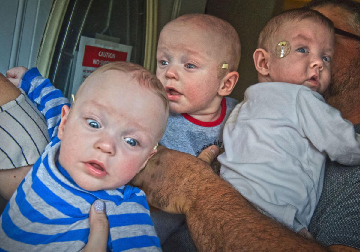 Norwood triplets, born on different days in different years, beat the ...