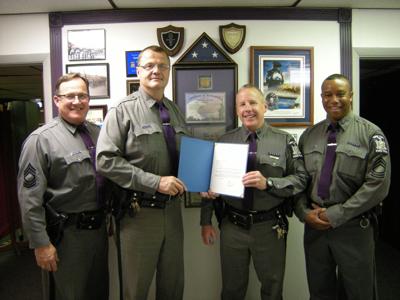 State police station commanDer gets 25-year pin | Arts and Life ...