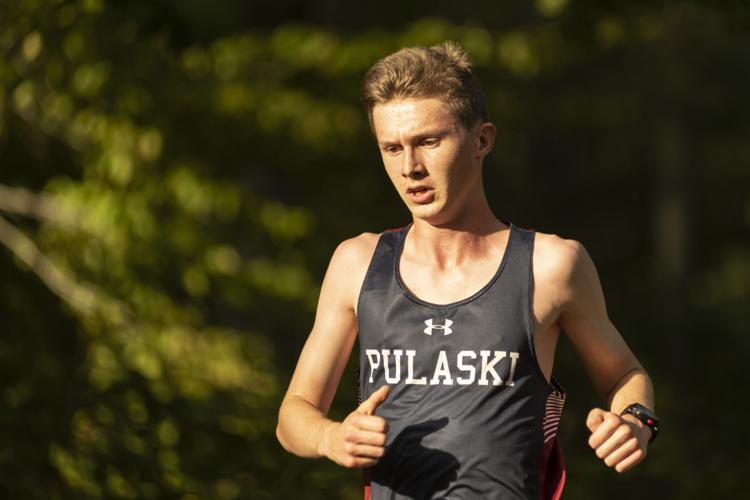 The Blue Devils boys cross country team running toward history | Oswego ...