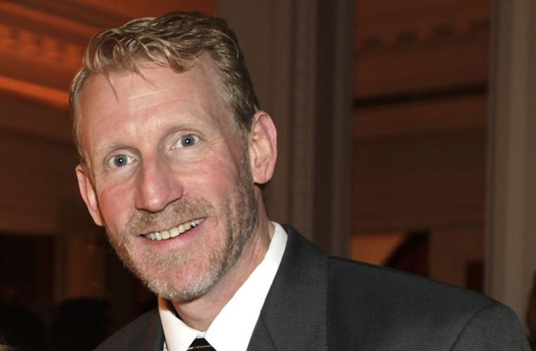 Macon Moore, hospital executive and co-founder of the Rolling Elvi, has ...