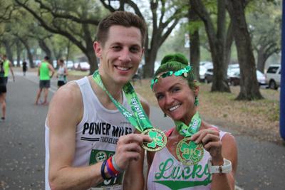 Richard Bouckaert takes in a few suds on his way to Shamrockin' Run win ...