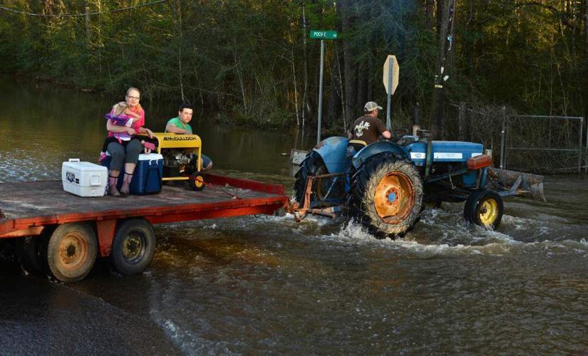 Flood updates: Amite River falls Monday, but flooding concerns remain ...