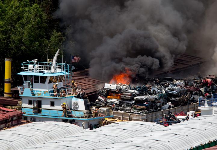 Barge on fire in Mississippi River near Huey P. Long Bridge starting to ...