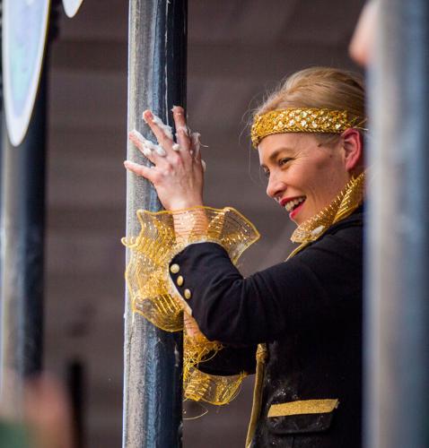 Photos: Annual 'Greasing of the Poles' event kicks off Mardi Gras ...