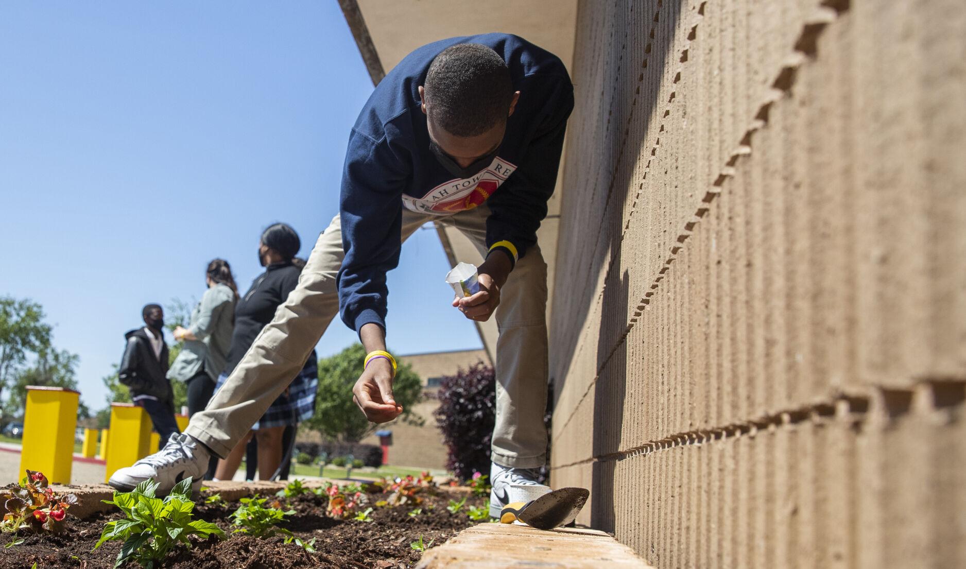 Photos: Einstein Charter School students plant flowers and trees to ...