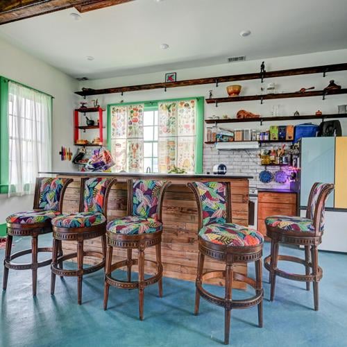 A world-traveling couple returns to New Orleans and builds a Bywater ...