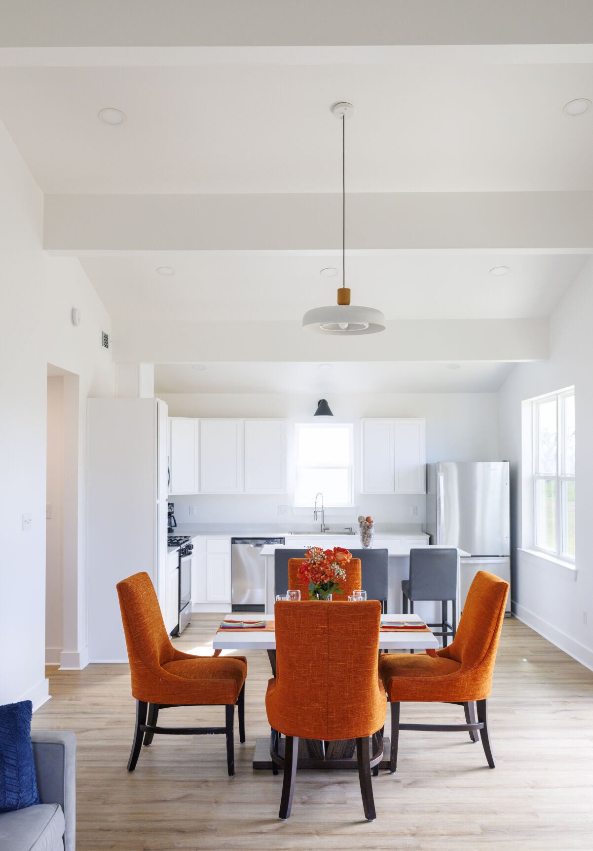 Mid mod design, storm-resistant building in new community ...