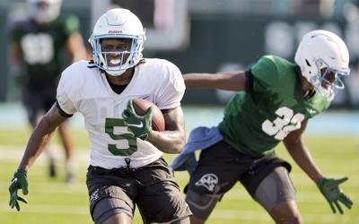 Notebook: Tulane running back Ygenio Booker has been playmaker in camp ...