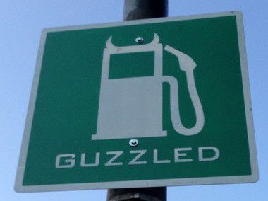 'Guzzled' guerrilla artists answer questions about fake traffic signs ...