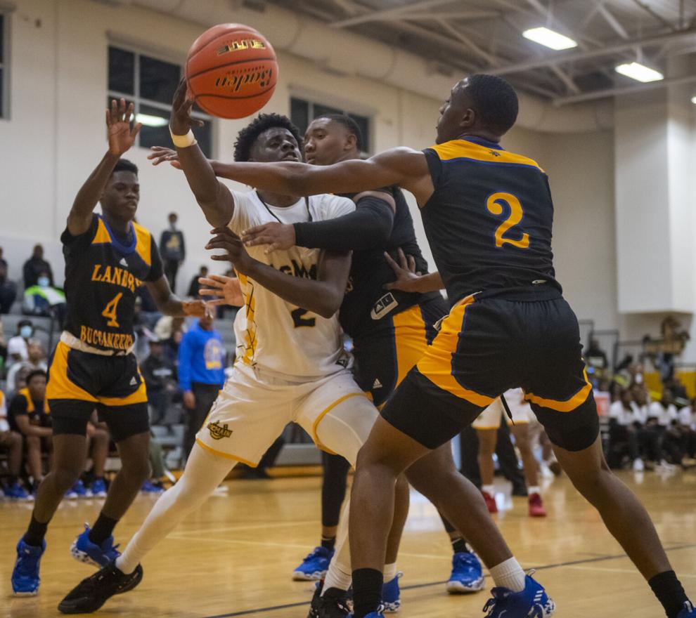 Photos: Reigning 4A state basketball champs McMain High School hosts L ...