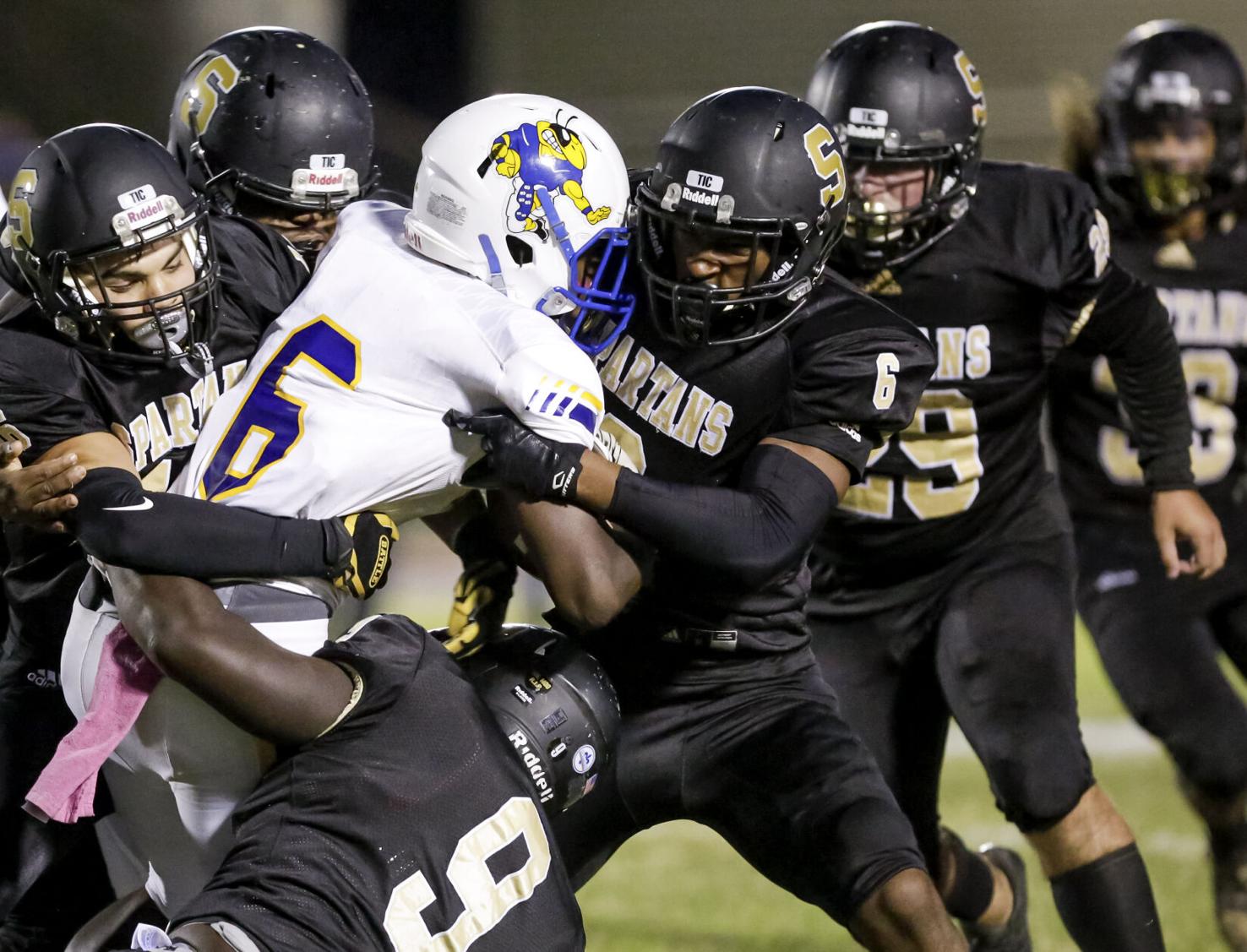 Photos: Salmen loses to St. Martin, 21-9, in season opener for Spartans ...