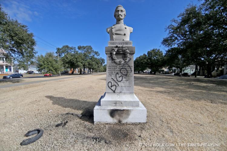 Confederate monument vandalized with paint, burning tire | Weather ...