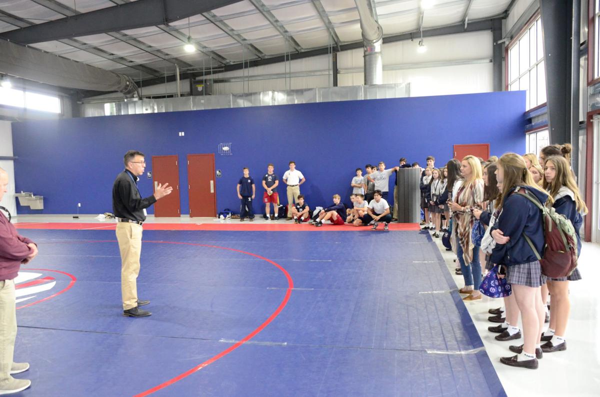 Archbishop Hannan High School wrestling and cheer teams grateful for ...