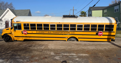 New Orleans school bus transporting students gets stuck sinking pothole ...