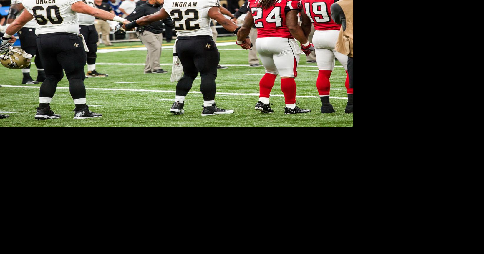 Sign of unity: Saints. Falcons join hands after national anthem on ...