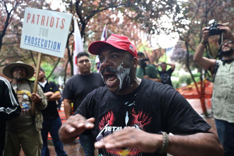 Clashing protesters draw blood, block traffic in downtown Portland ...