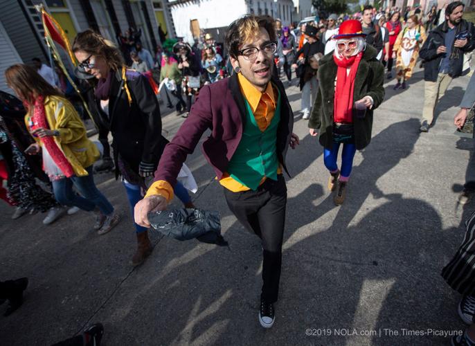 See the krewes of Red Beans and Dead Beans meet on Lundi Gras 2019 ...
