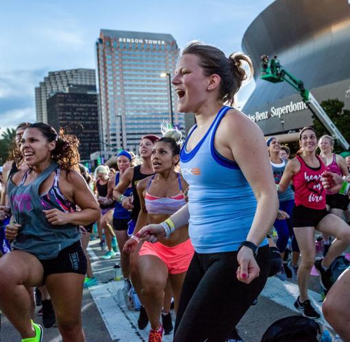 Photos: Rise & grind: 20,000 get active at the Mercedes-Benz Superdome ...