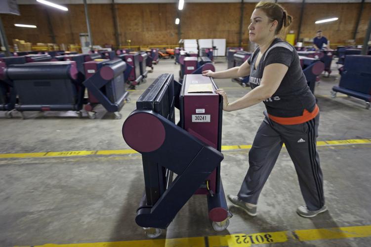 Photos: Election Day Eve, Polling Machines Leave Warehouse for Orleans ...