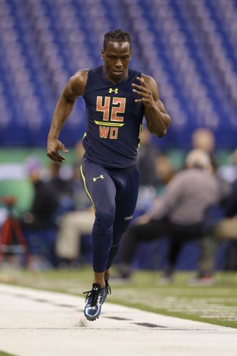 John Ross, who broke Chris Johnson's combine record with a 4.22 40 ...