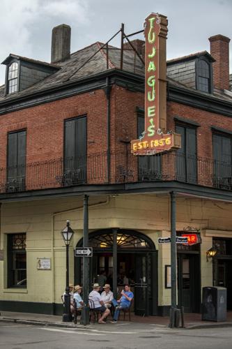 Mike Motwani wants to replace former Tujague's building's iconic sign ...