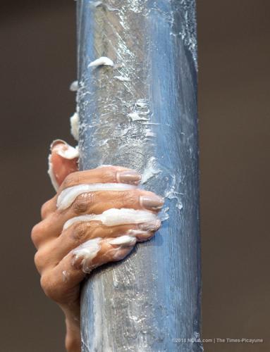 TV news anchor wins the 'Greasing of the Poles' Mardi Gras contest ...