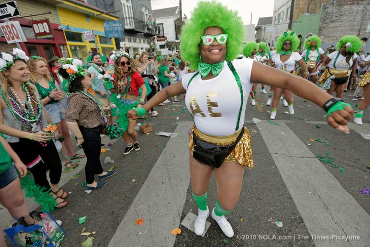 Irish Channel parade flows slowly down Magazine on St. Patrick's Day ...