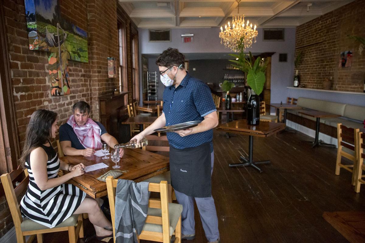 New Orleans dining rooms reopen with familiar flavor but new rules ...