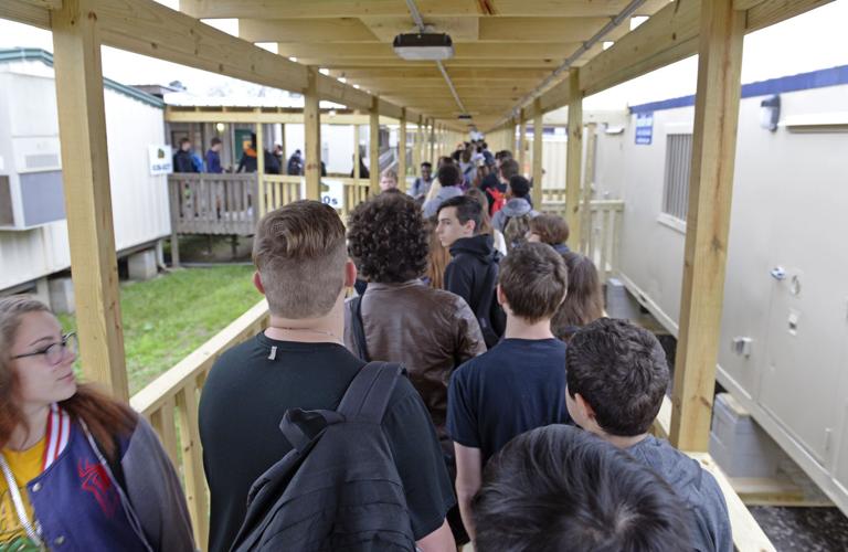 Video: Excited St. Amant students stream into school for first time ...