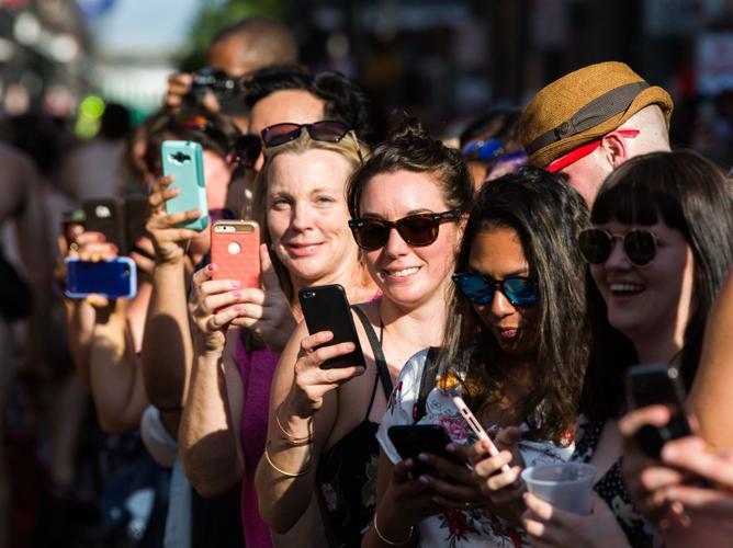 World Naked Bike Ride participants bare all on the streets of New ...