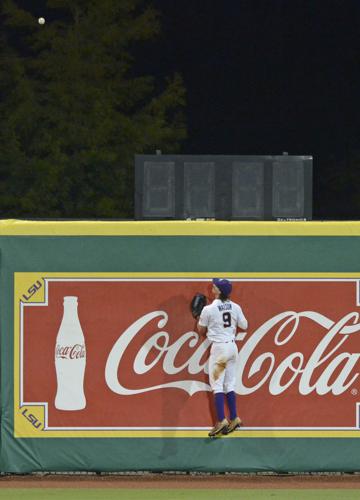 A face full of water? LSU's Zach Watson got his post-home run face bath ...
