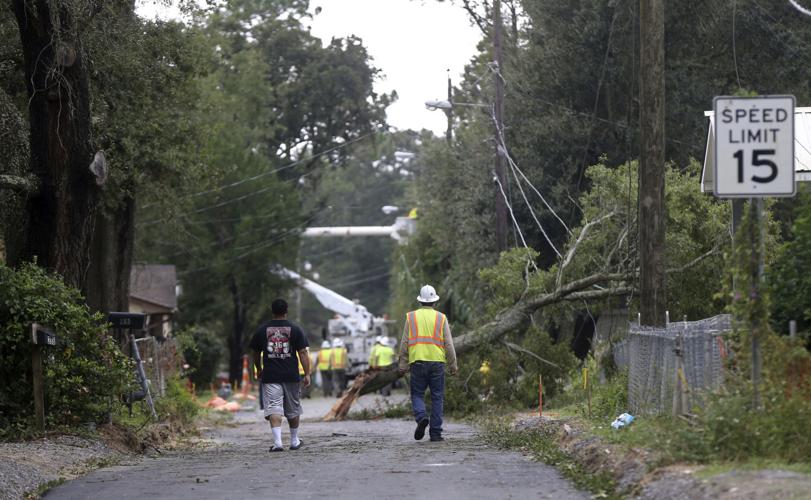 Photos: Hurricane Nate brings flooding, power outages, damage to Gulf ...