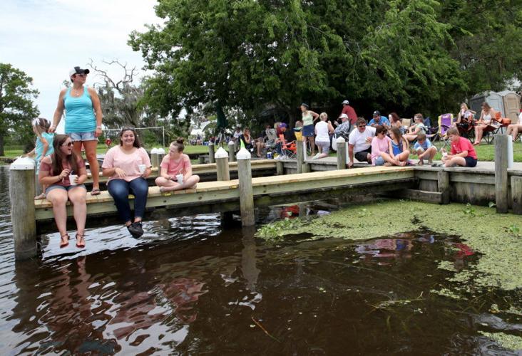 Pirogue races slice through Bayou Liberty waters | Archive | nola.com