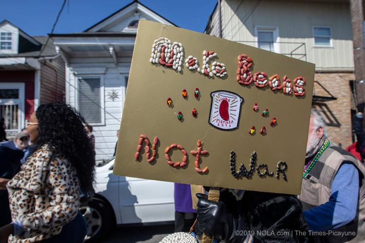 See the krewes of Red Beans and Dead Beans meet on Lundi Gras 2019 ...