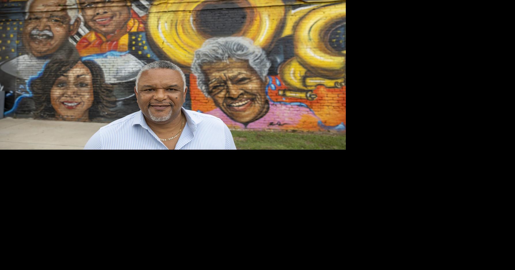 Block-long mural depicts businessman Troy Henry's family legacy on a ...
