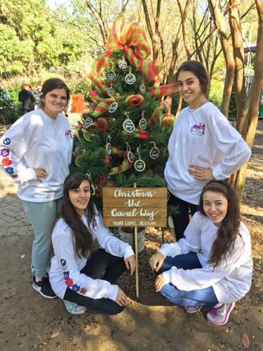 Mount Carmel Academy students decorate tree for Celebration in the Oaks ...