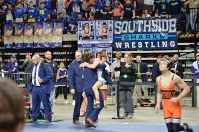 WATCH: 2 high school wrestlers body slammed their coach after winning ...