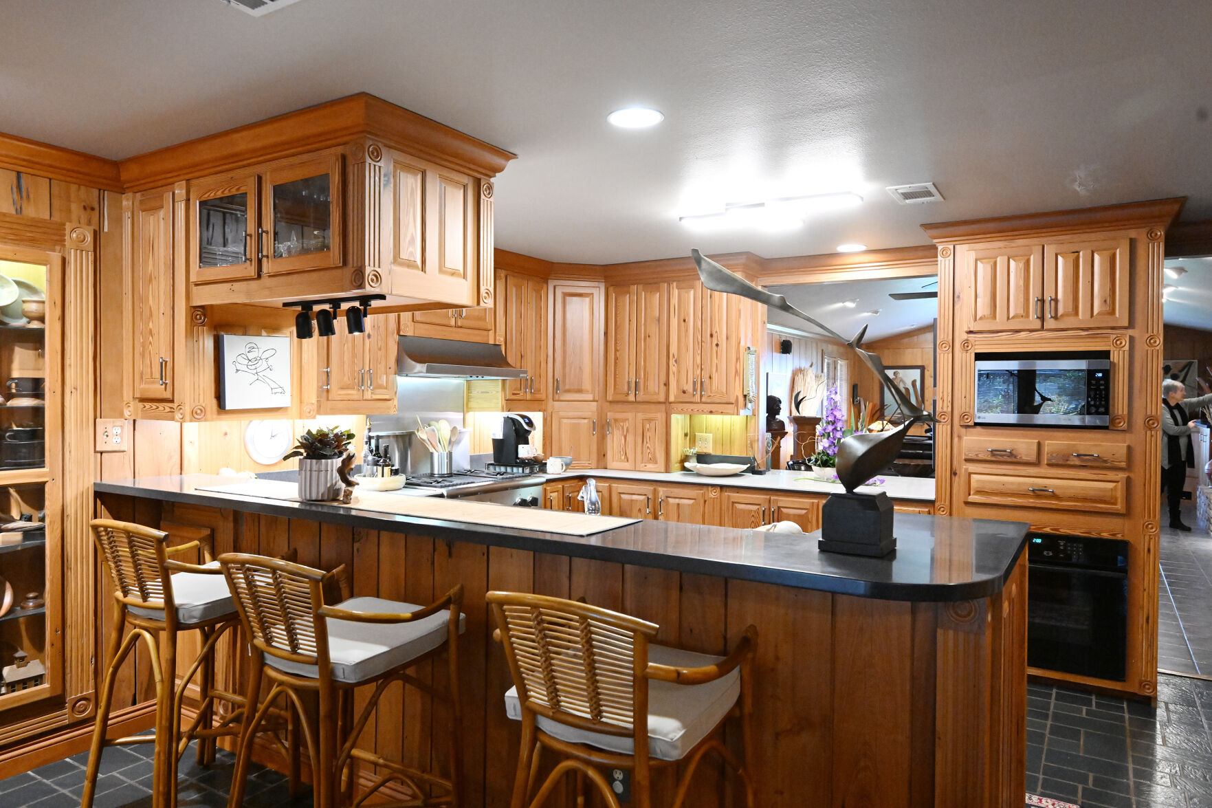 Warm cypress paneling, old St. Joe brick and Louisiana artwork meld in ...