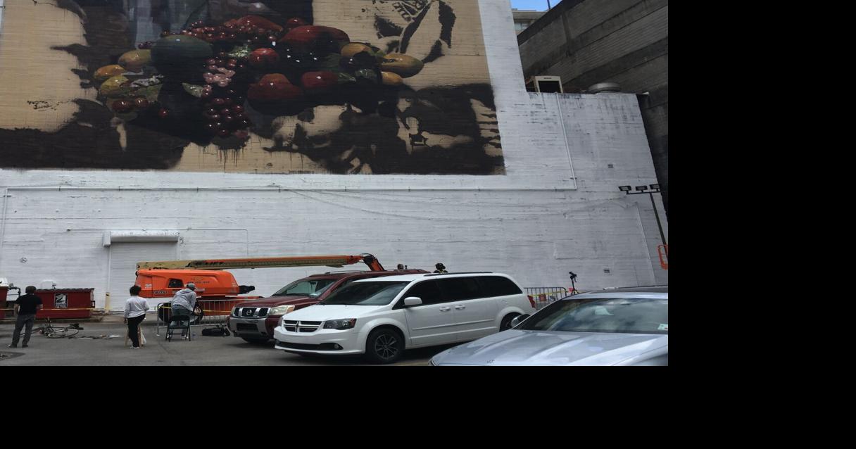 Mural addressing hunger nearing completion on back of Orpheum Theater ...
