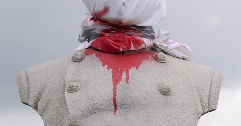 Statue of Confederate officer Charles Didier Dreux vandalized in New ...