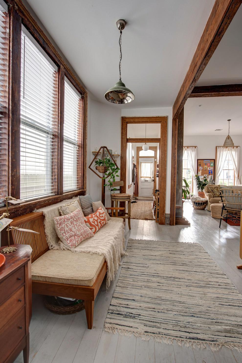 An artist and a minimalist find balance in sharing a renovated Uptown ...