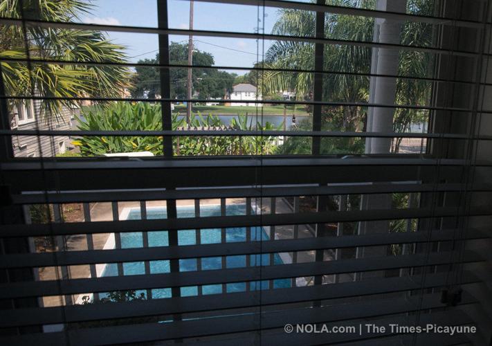 On permanent vacation: one couple's colorful, art filled Bayou St. John ...