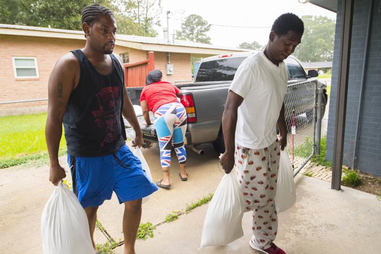 Sandbagging sites still busy Saturday morning as Hurricane Barry ...