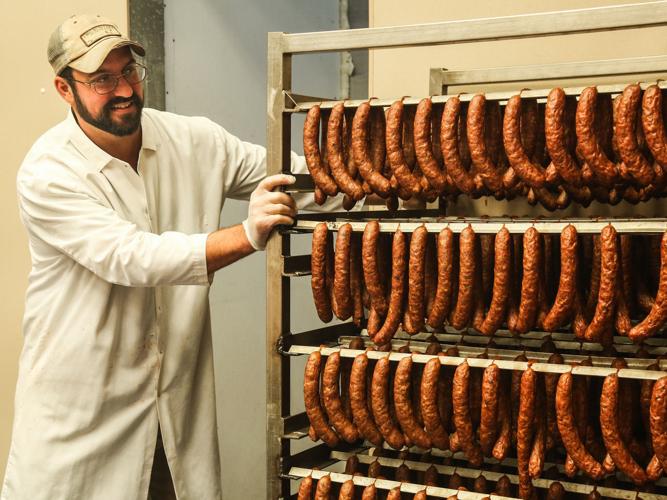 On a riverside farm, a wild hog cook-off, a football tailgate, a boost ...