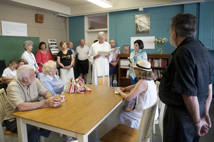 Checking out at the new library at the Bishop Perry Center | Parties ...