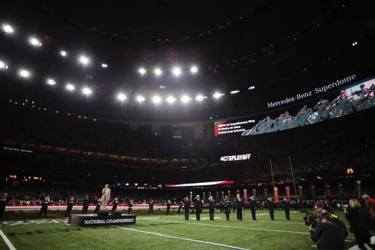 Watch: Donald Trump takes to Superdome field before LSU-Clemson, hears ...