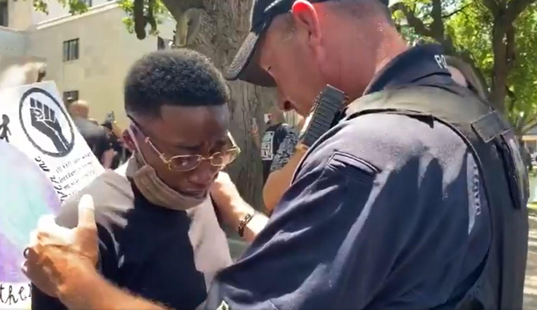 Watch: Shreveport police officer consoles crying protester during march ...